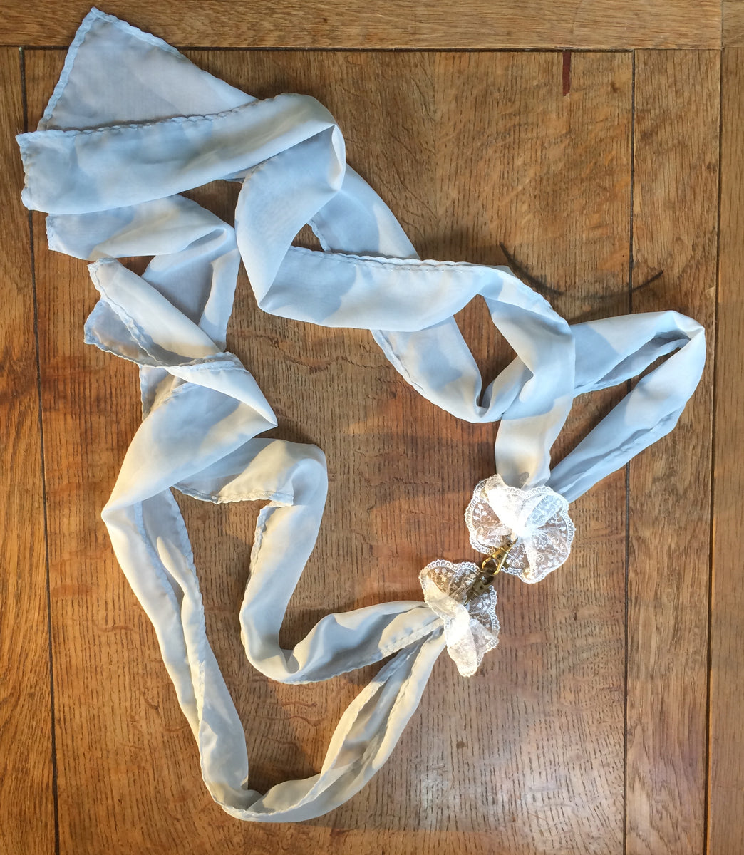 Dusky blue and white lace hand restraints – The Witch's Britches