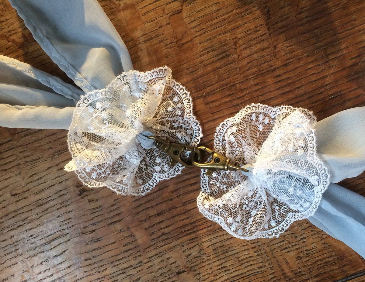 Dusky blue and white lace hand restraints – The Witch's Britches